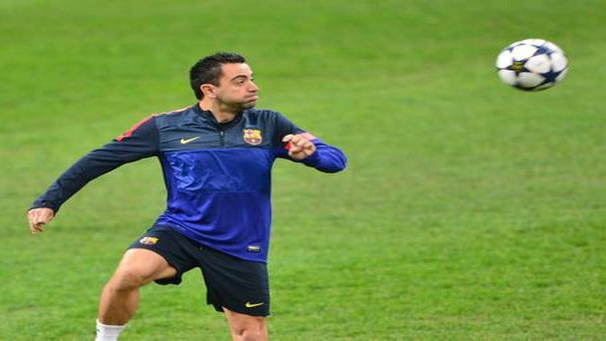 Xavi distances himself from 'next Guardiola' tag ahead of coaching ...