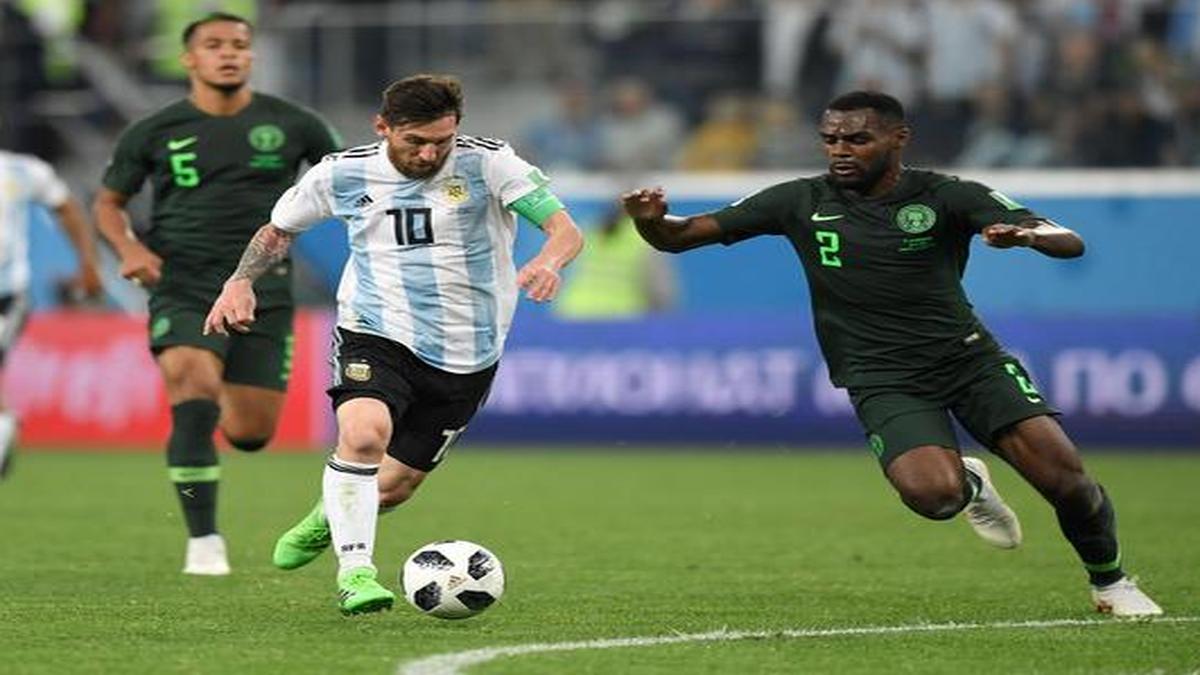 Messi, Rojo rescue Argentina from humiliating early exit - Sportstar