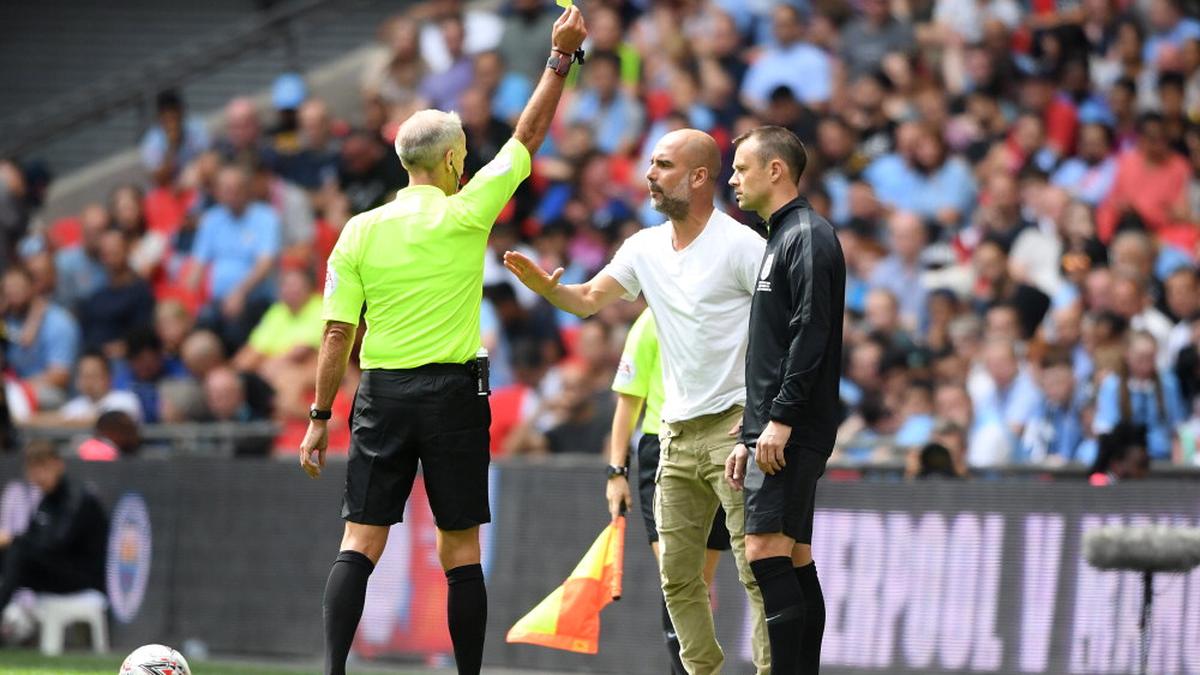 Pep Guardiola becomes first Premier League manager to receive yellow ...