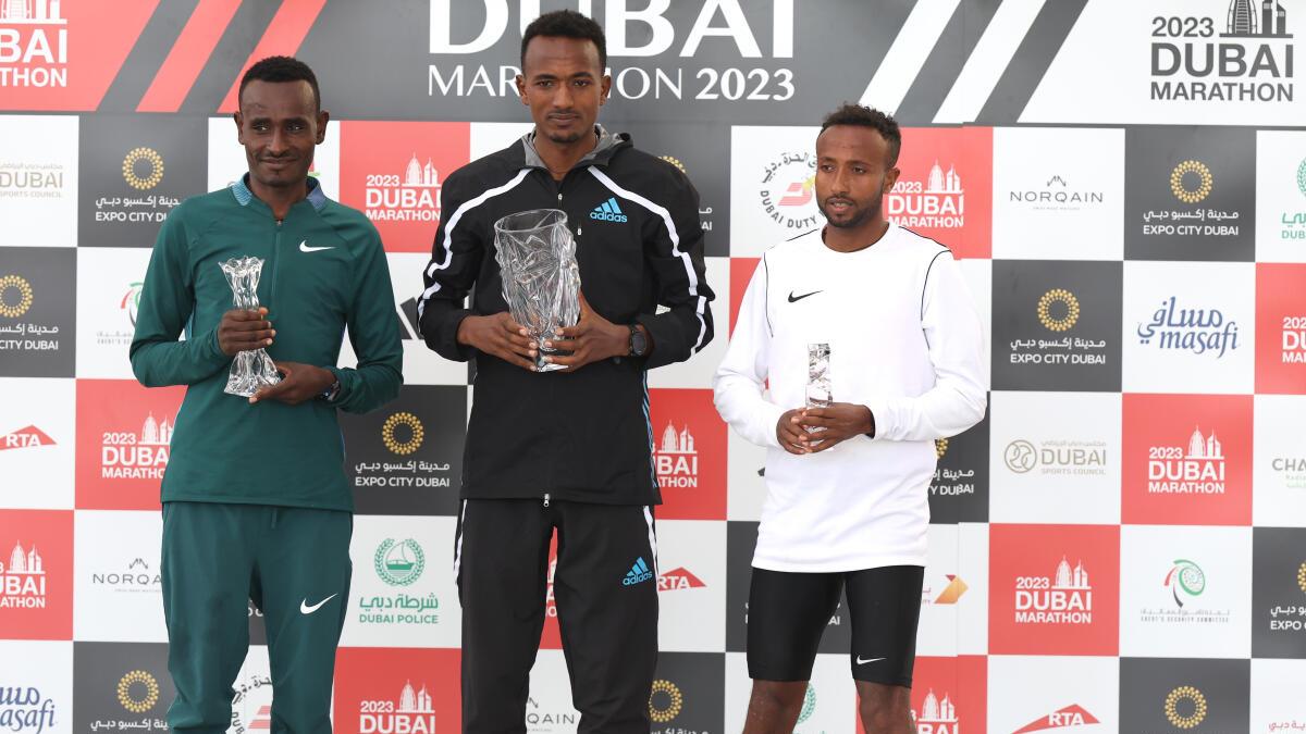 World champion Tola’s wife Dera Dida and brother Abdisa Tola win Dubai ...