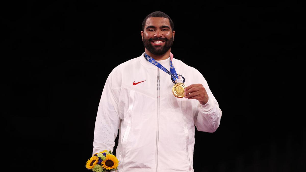 Tokyo wrestling gold medalist Gable Steveson balancing 2024 Olympic ...