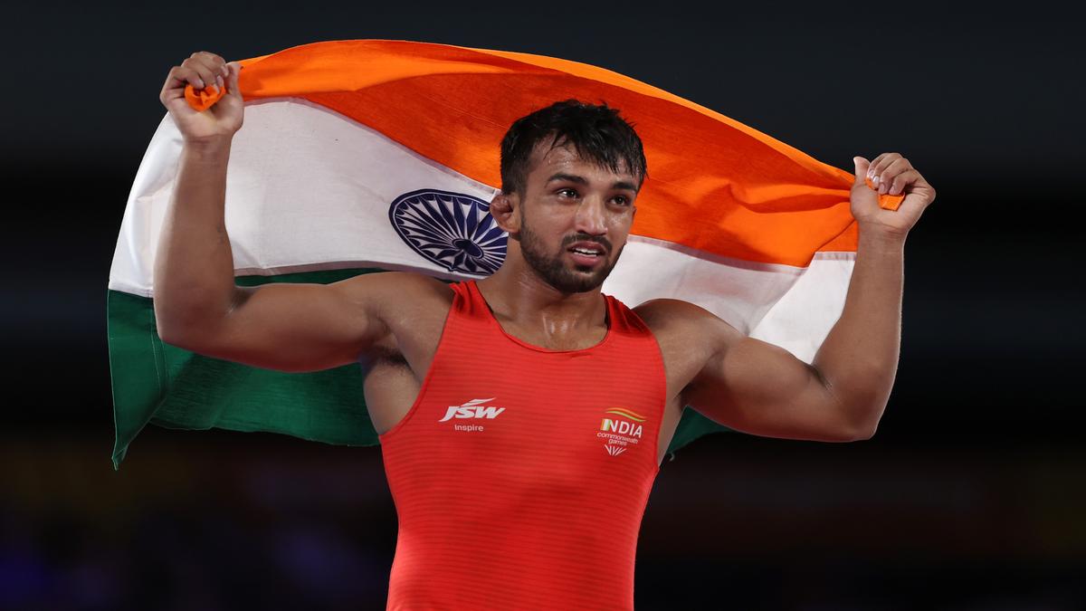 CWG gold medallist Naveen, Pankaj Malik win Wrestling World ...