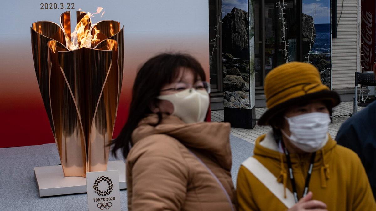 Thousands flock to see Olympic flame in Japan despite virus fears ...
