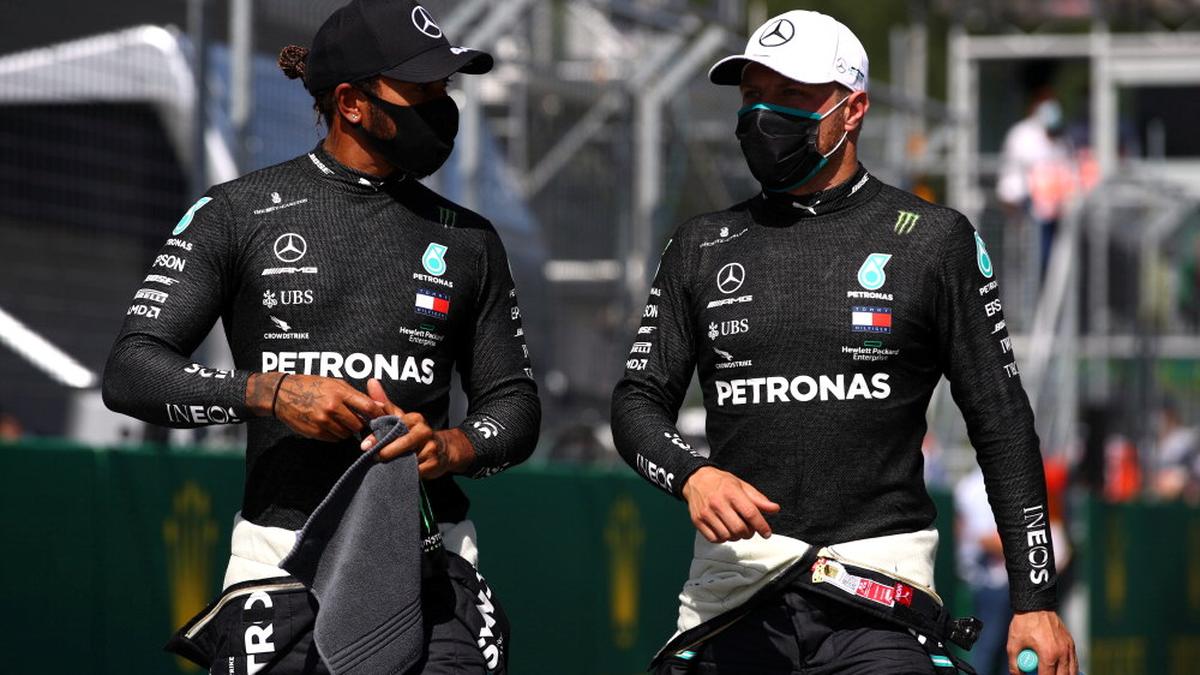 Masks and remote-control trolleys for F1's new-look podium - Sportstar