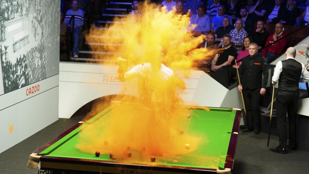 Vandalized snooker table reclothed, back in play at world championship ...