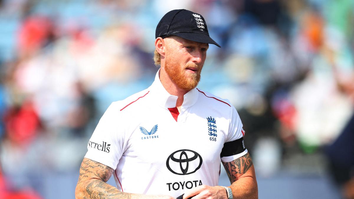 Why are Indian players wearing black armbands during Day 1 of the first ...