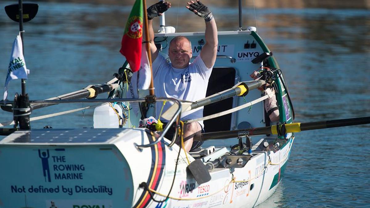 Disabled former British marine smashes solo Atlantic rowing record ...