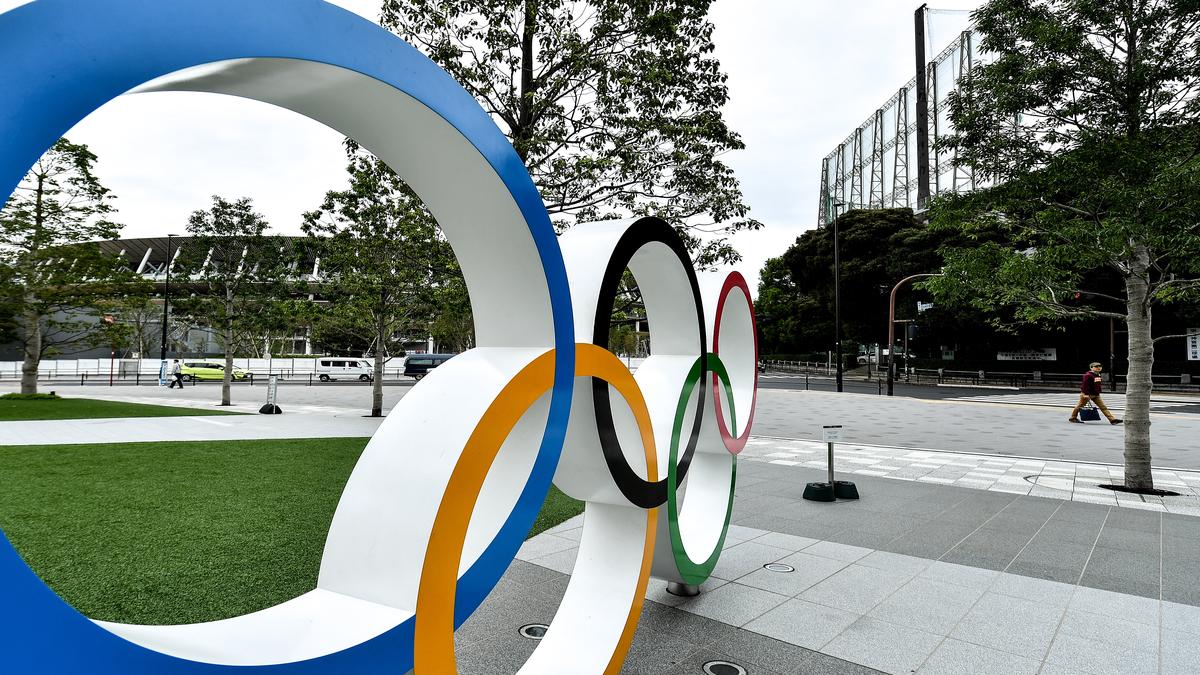 Official in IOC refugee team for Olympics tests positive for COVID-19 ...