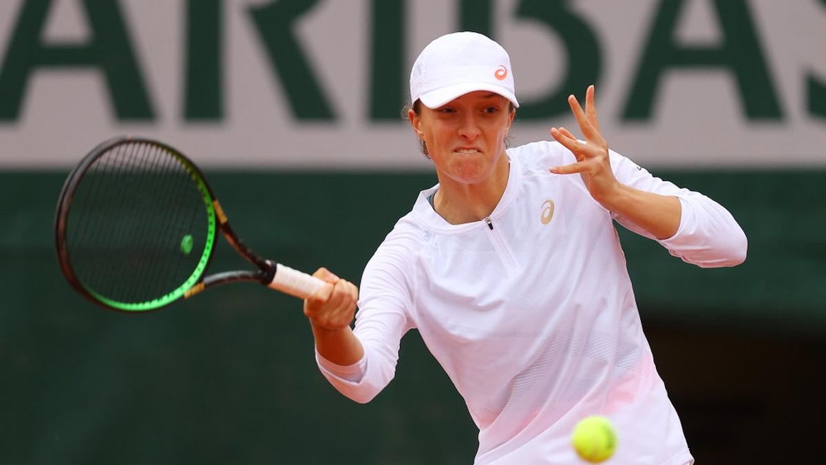 Polish teenager Swiatek sweeps past Bouchard into last 16 - Sportstar